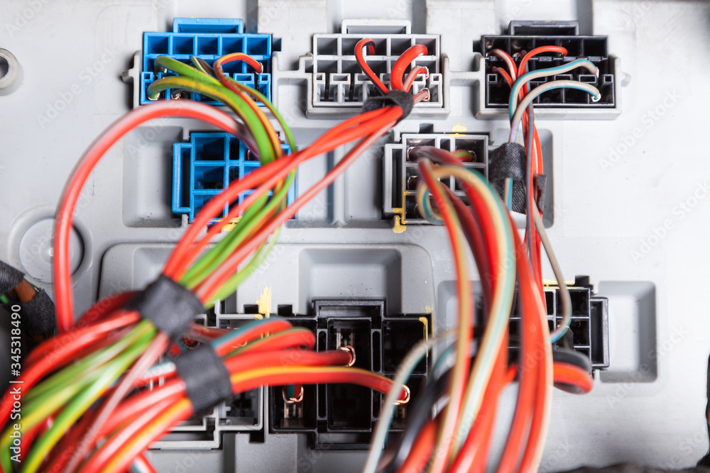 The metal case of the device with connectors and multi-colored ...