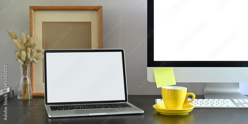 Photo of computer laptop with white blank screen putting on black ...