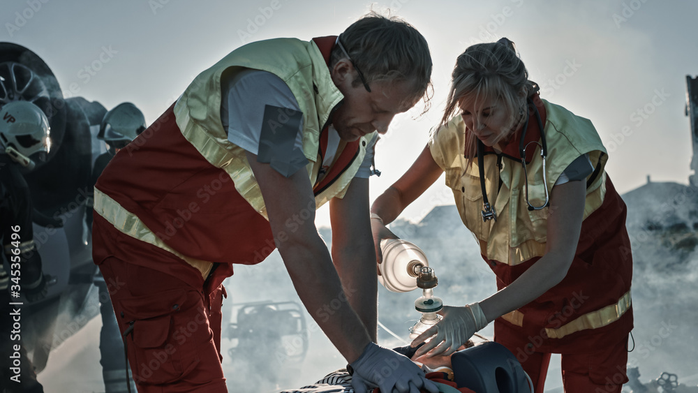 On the Car Crash Traffic Accident Scene: Paramedics Saving Life of a ...