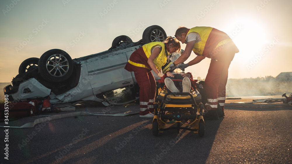 On the Car Crash Traffic Accident Scene: Paramedics Saving Life of a ...