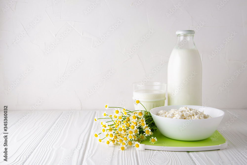 Kefir drink with and fermented dairy product curd on the white ...