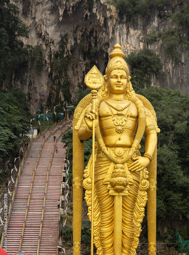 huge gold statue in Batu caves, Malaysia Stock Photo | Adobe Stock