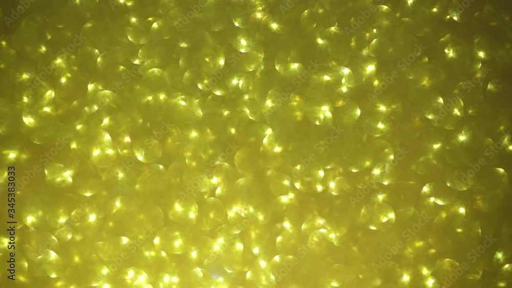 Gold glitter background with sparkling texture. Golden shimmering light. Stock-Video | Adobe Stock