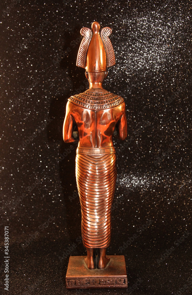 Bronze statuette of the Egyptian Tutankhamun. Figure of the Pharaoh ...