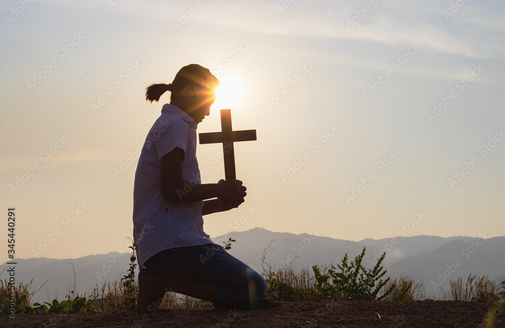 Christian, Christianity, Religion copy space background. Human kneeling ...