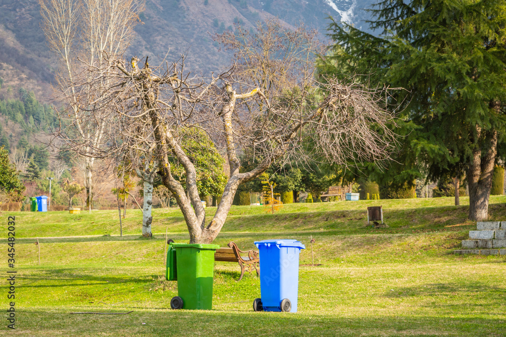 Trash Bins For Waste Collection And Segregation At A Public Park In trash-bins-for-waste-collection-and-segregation-at-a-public-park-in