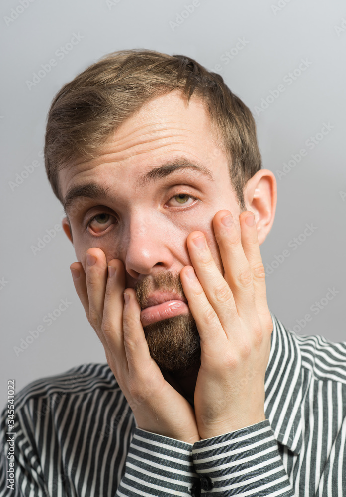 Closeup portrait, headshot young tired, fatigued business man hand ...