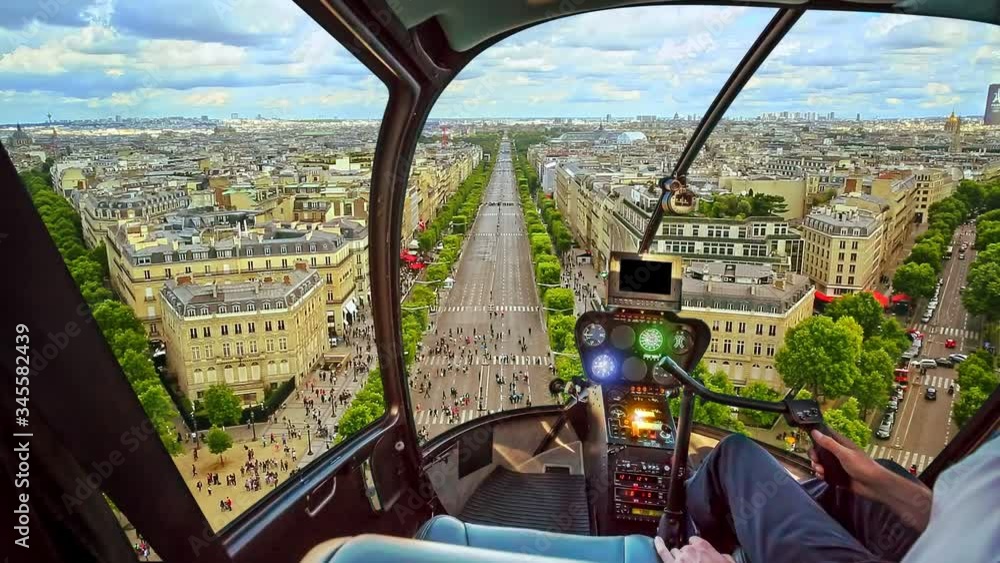 Helicopter cockpit flying on Paris skyline of the French capital ...