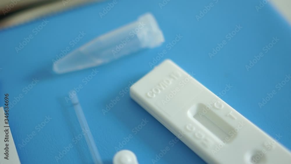Diagnosis of coronovirus sars-cov-2. Unpacked set of express test Covid ...