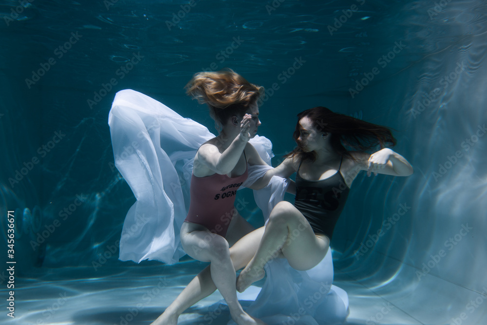Two Beautiful Lesbian Girls Are Swimming Underwater Attractiveness
