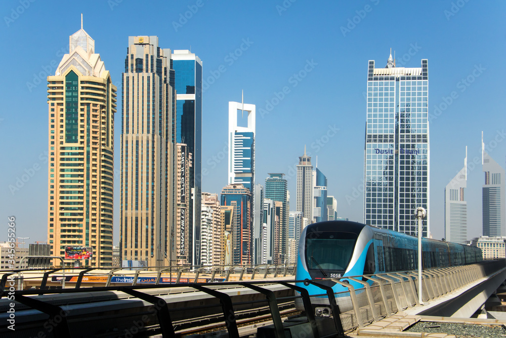 DUBAI, UAE, JAN 16 2018, A modern train drive to a station in Dubai ...