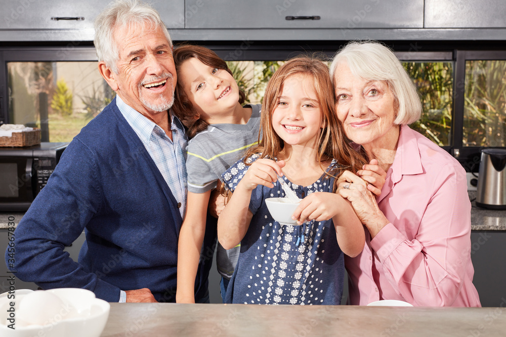 Happy grandparents together with grandchildren Stock Photo | Adobe Stock