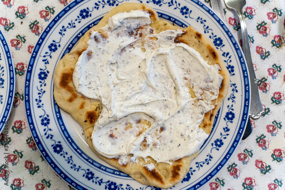 Greek Pita Chicken Souvlaki Kalamaki wrap opened with Tzatziki yogurt ...