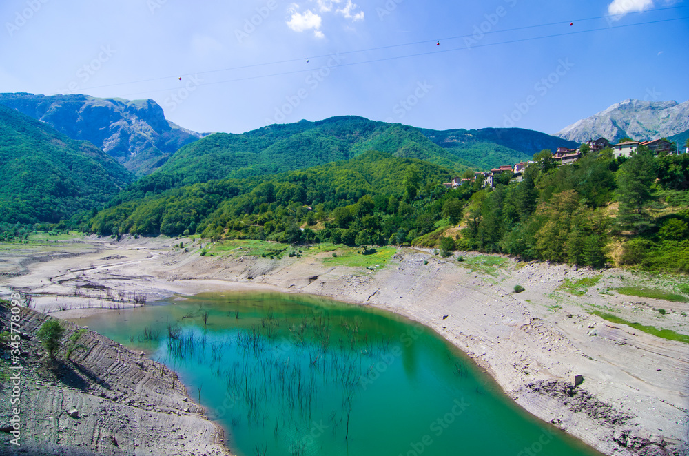 drought and temperature rise catastrophe, dry river and town without ...