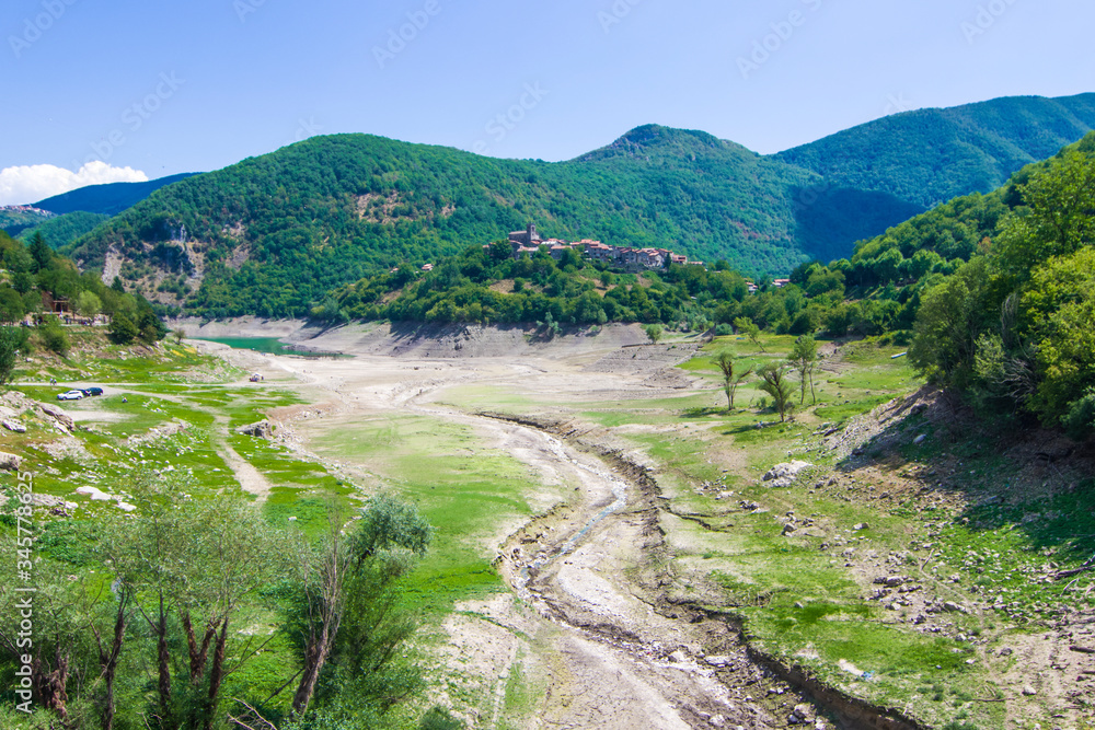 drought and temperature rise catastrophe, dry river and town without ...