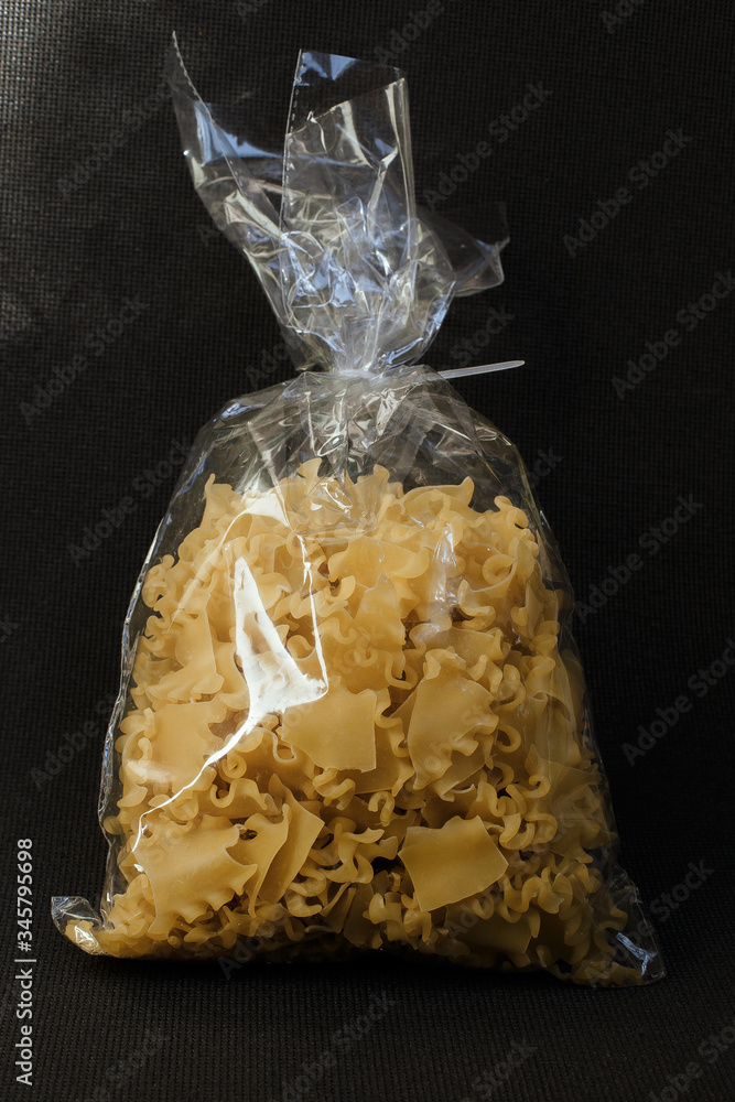 Pasta packaging template Isolated on black background. Raw spaghetti ...