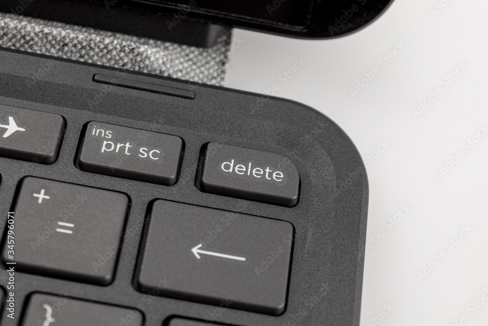a key on the keyboard labeled delete, complete data destruction ...