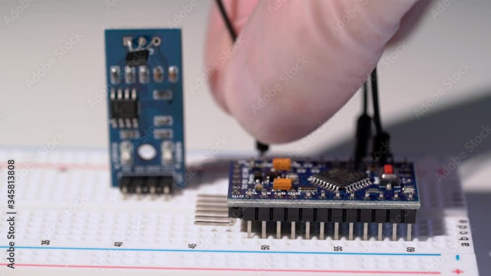 Breadboard prototyping with microcontroller arduino components and wire ...