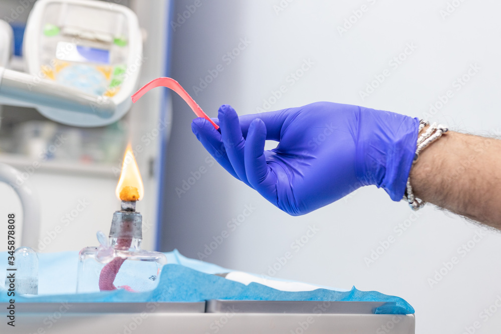 Foto de Fireproof test on military fabric sample. High tech chemistry ...