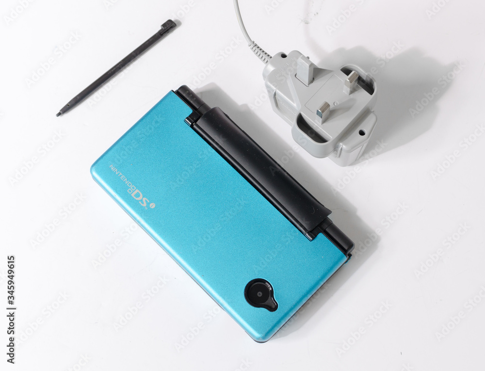 london, england, 05/05/2019 A metallic blue nintendo ds dsi hand held ...