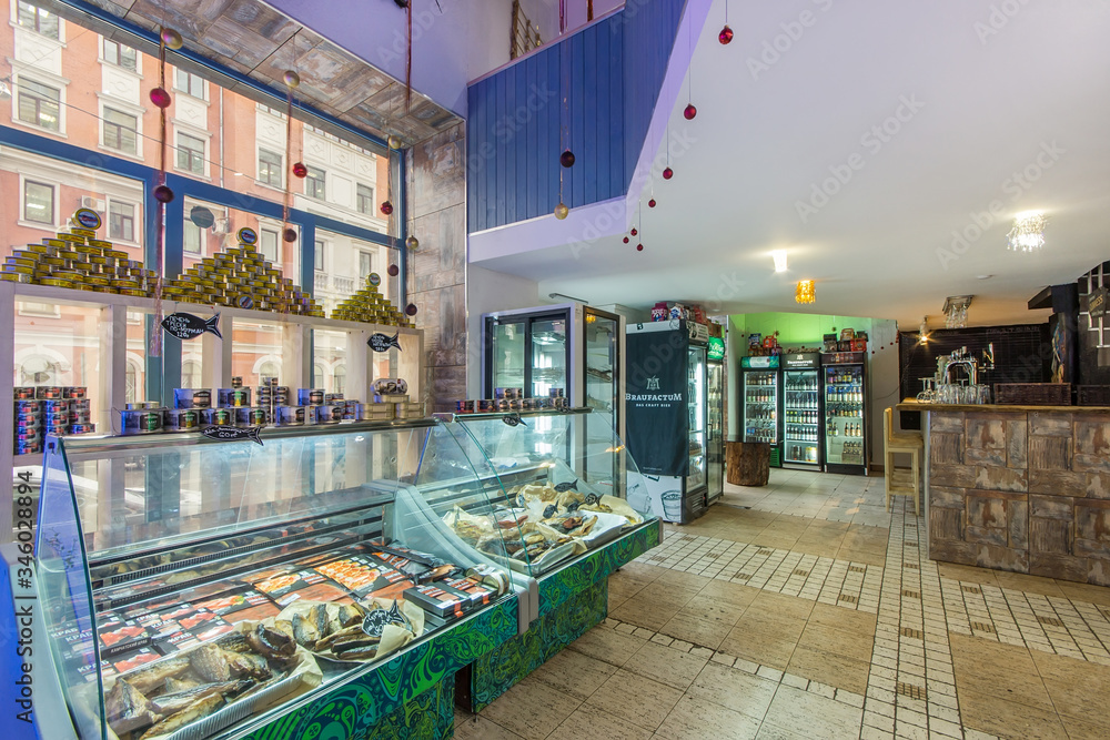 The seafood shop with the bar counter. Fish counter displays. Beverage ...