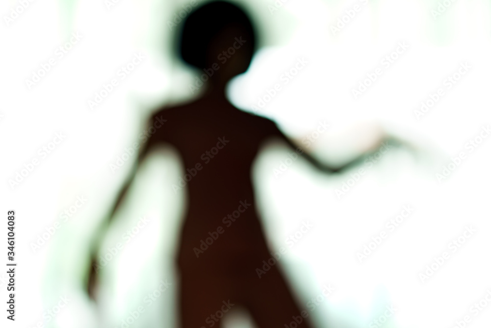 Blurred silhouette of human body look like alien. Stock Photo | Adobe Stock