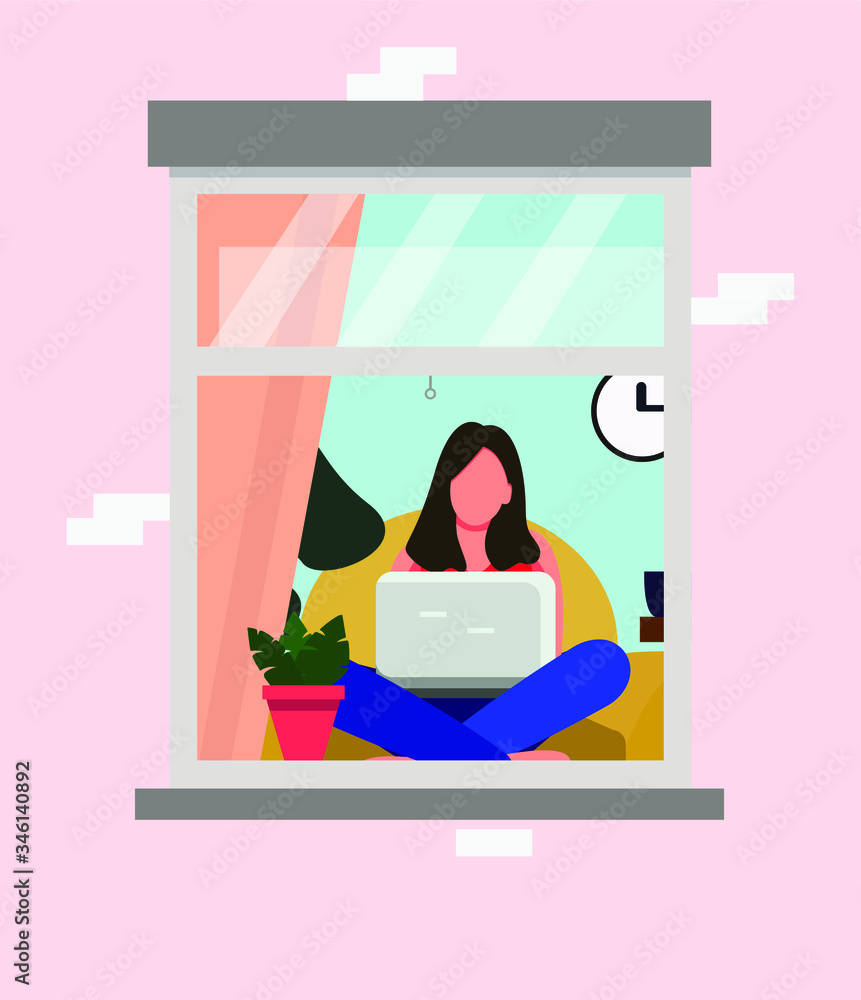 The concept of staying at home. a woman sits with a laptop and looks ...