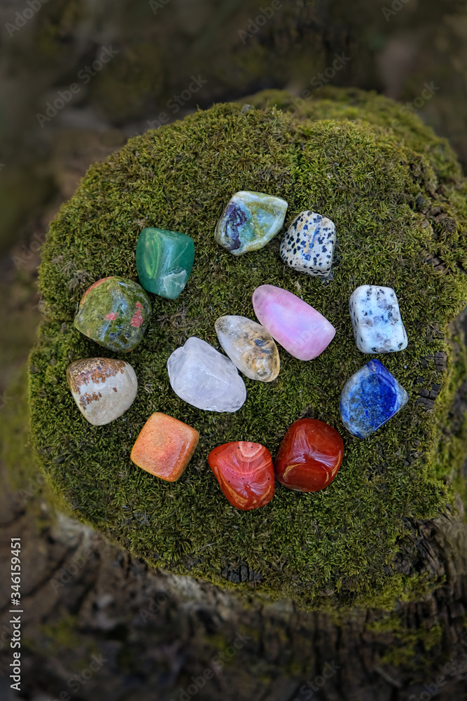 colorful gemstones on nature background. Magic rock crystals for life ...