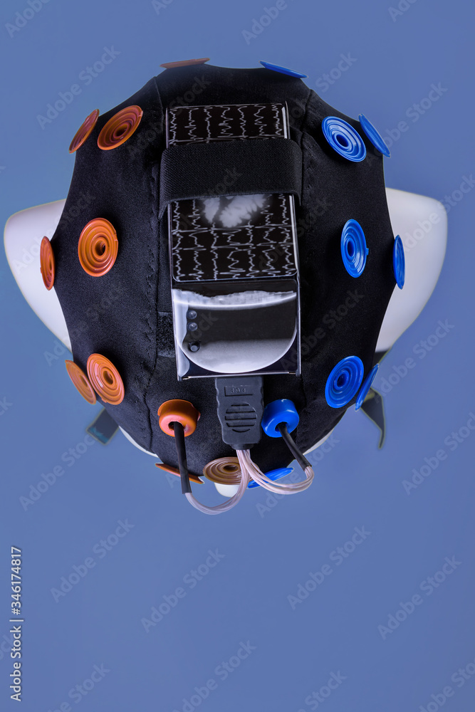 model head with EEG electrodes on blue background , EEG headset ...