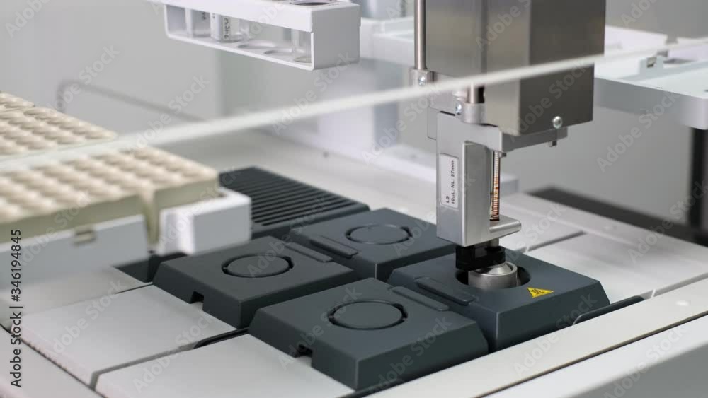 Automatic system to clean the syringe by using solvent. Syringe moves ...
