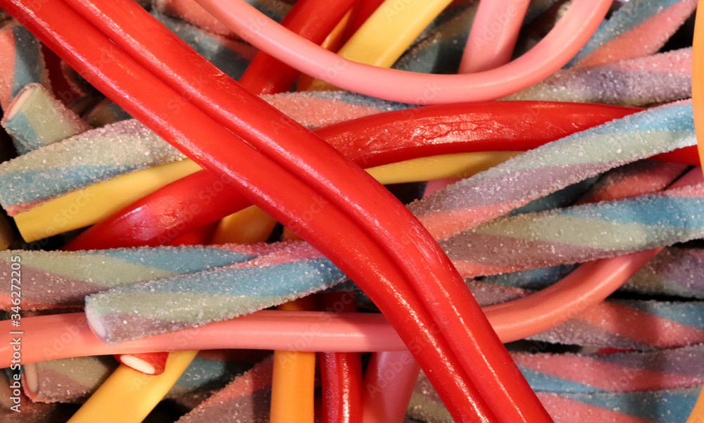 Foto de Different types of candy that give a beautiful color to the ...