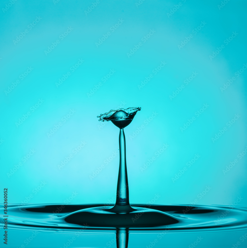 Water Drop Collisions Macro Photography with blue background Stock ...