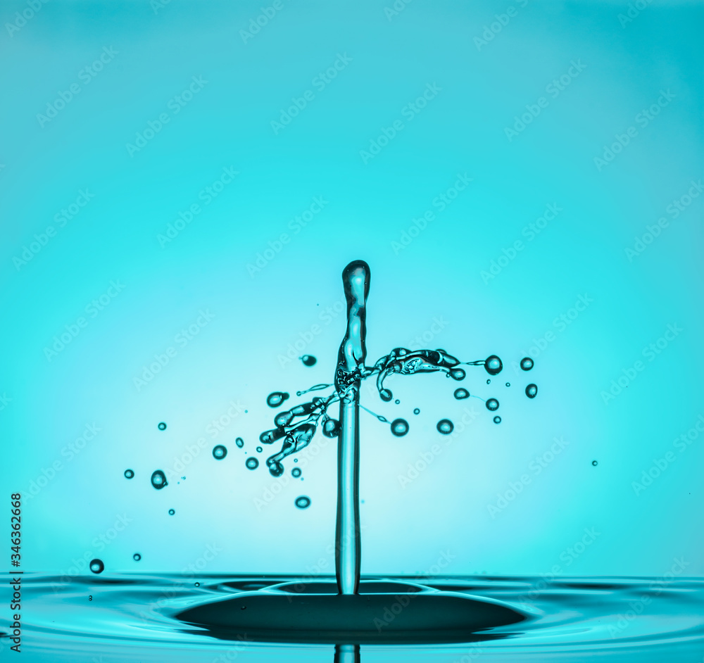 Water Drop Collisions Macro Photography with blue background Stock ...