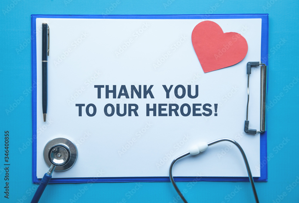 Thank You To Our Heroes text on clipboard. Stock Photo | Adobe Stock