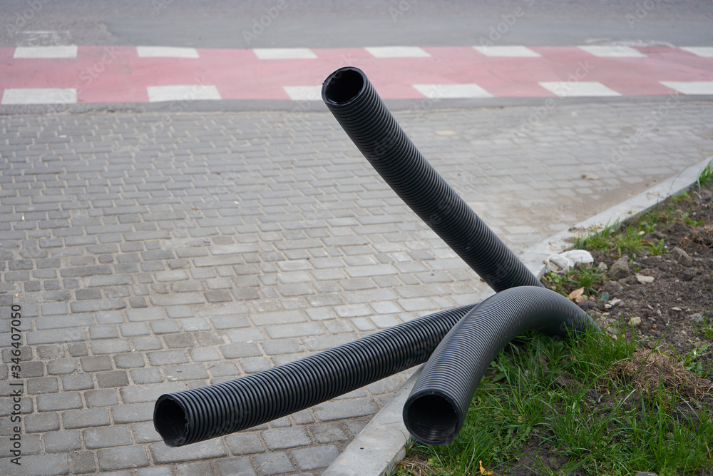 laying of corrugated pipes,corrugated pipes are buried near the road ...