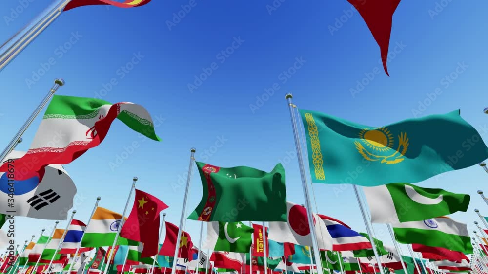 Many Asian continent flags. Various world flags flying on flagpoles ...