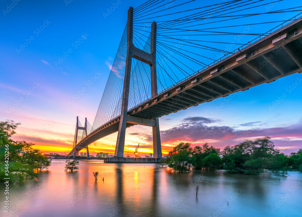 Beautiful sunset landscape at Phu My Bridge. This largest cable-stayed ...