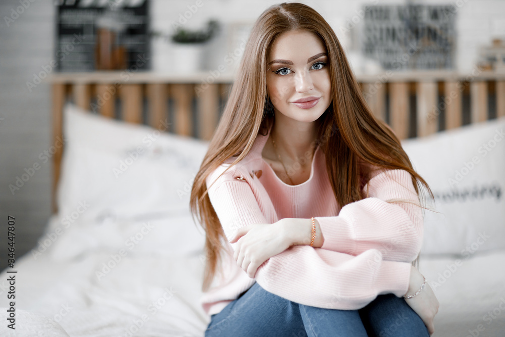 Pretty female with fair hair, dressed casually, looking with ...