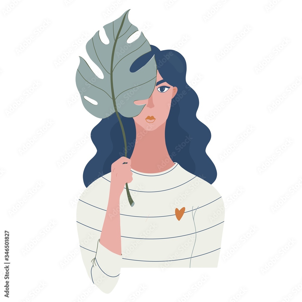Young pretty serious woman holding monstera leaf, hiding her face ...