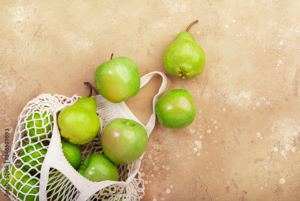 Fruits in reusable eco-friendly string mesh bag. Zero waste, plastic ...