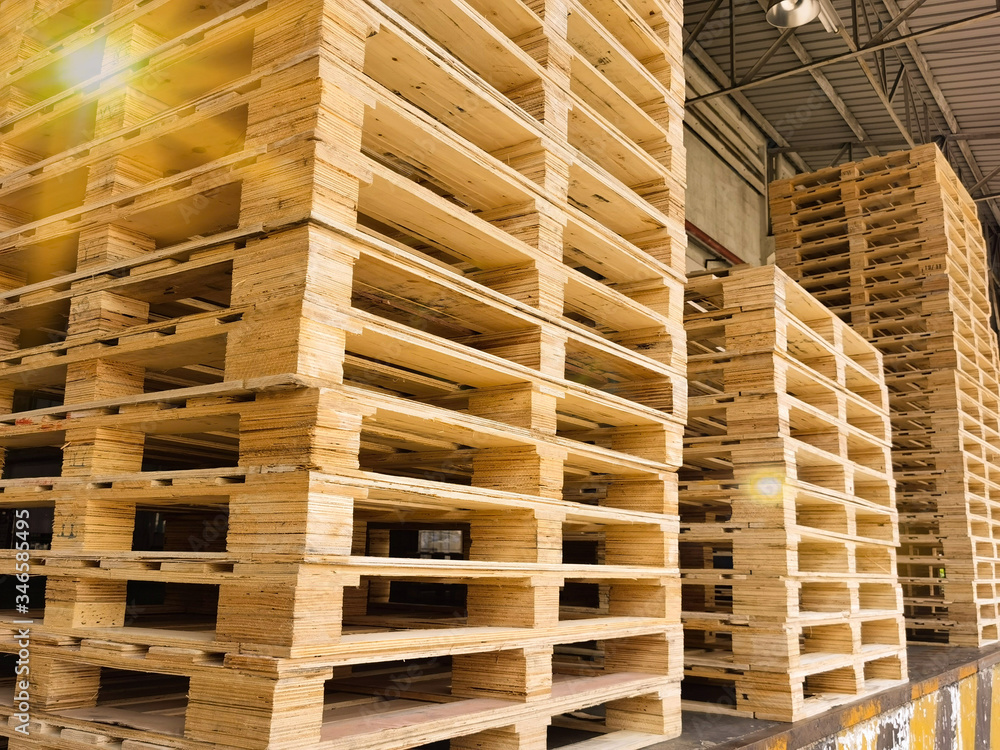 Wooden pallets stack at the freight cargo warehouse for transportation ...