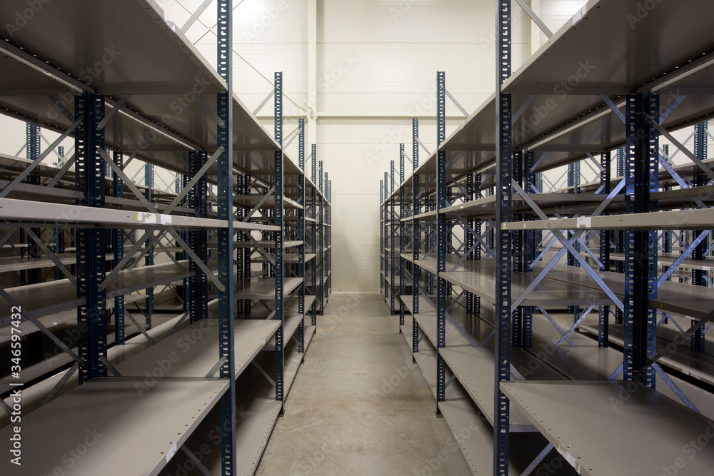 huge warehouse with empty racks inside for storage modern design, metal ...