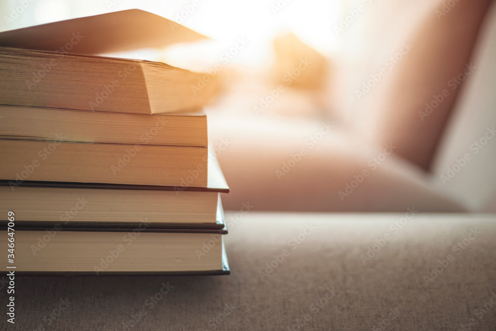 Stack of books on light background. Book stack in the library room and ...