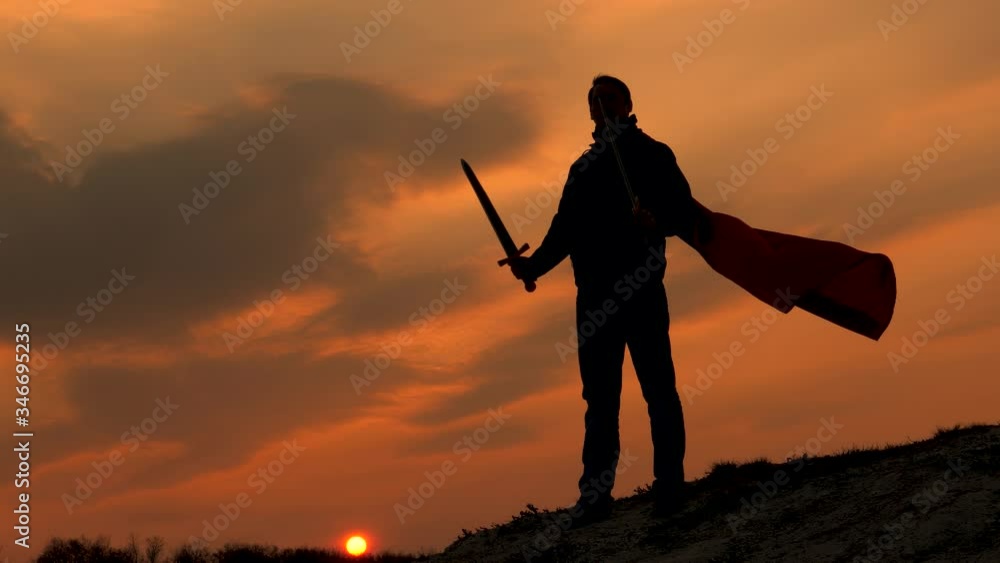 free man plays superhero. game of Roman legion. free male knight prays ...