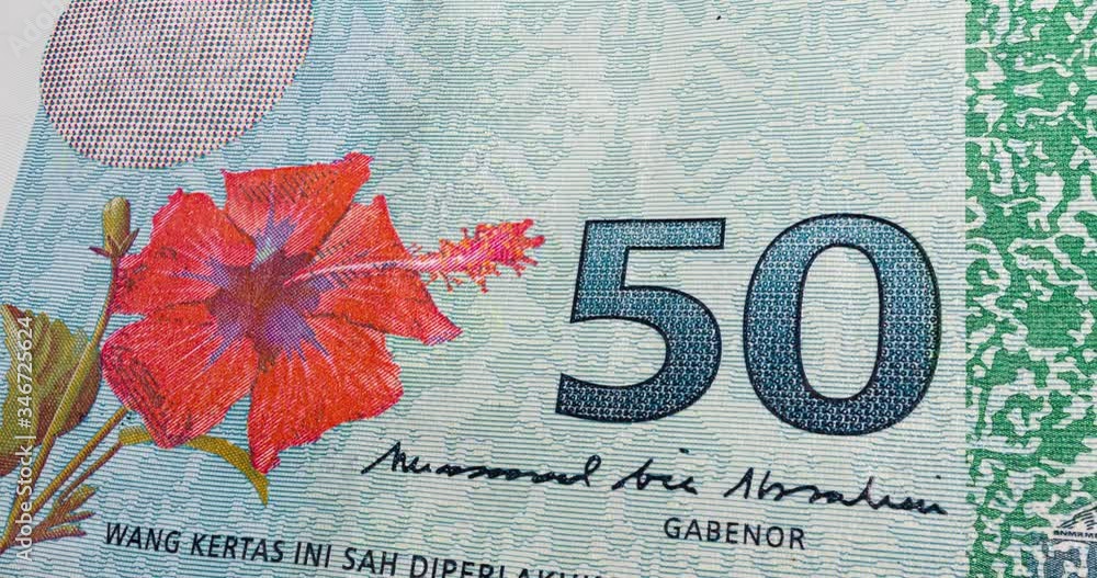 Extreme close up footage, panning over fifty Ringgit Malaysia. 4k ...