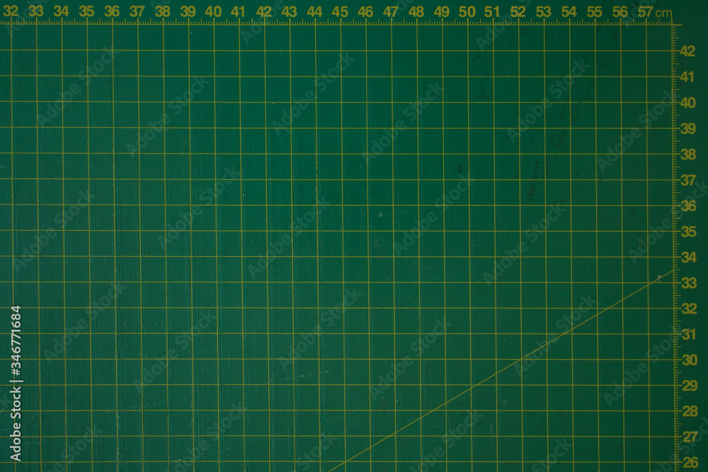 green cutting mat scale with scratch texture from cutter Stock Photo ...