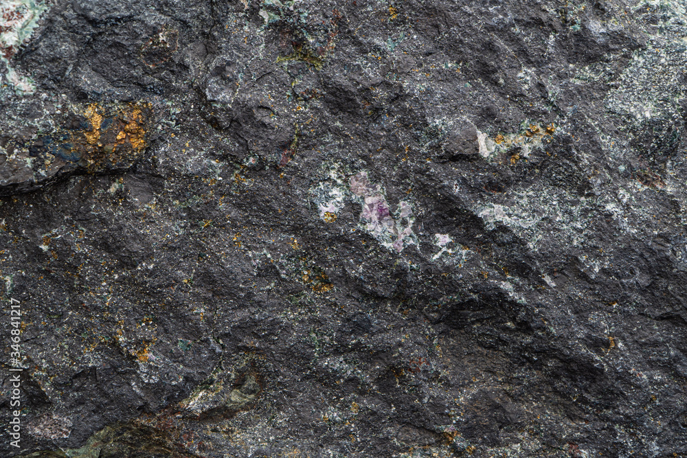 Magnetite iron ore texture close-up. Contains magnetit, pyrite, calcite ...