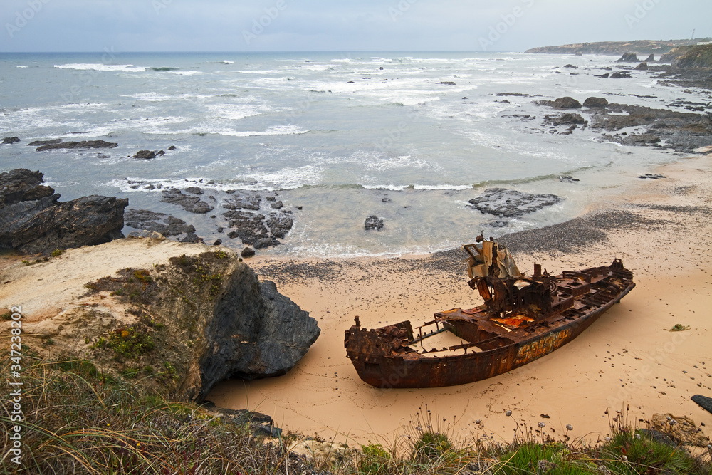 Ghost ship after shipwreck at beach of Vila Nova de Milfontes, Portugal ...