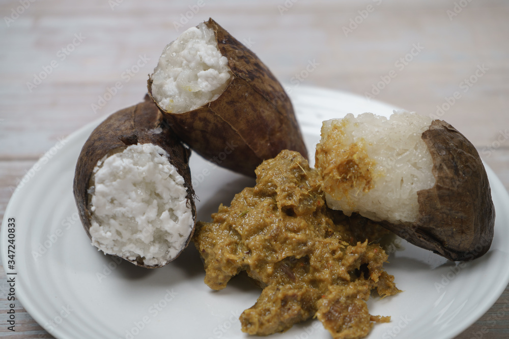 Glutinous rice steamed cooked with coconut milk in pitcher plants known ...
