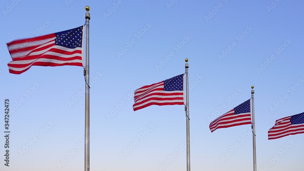 American flag of the United States of America floating in the sky on a ...